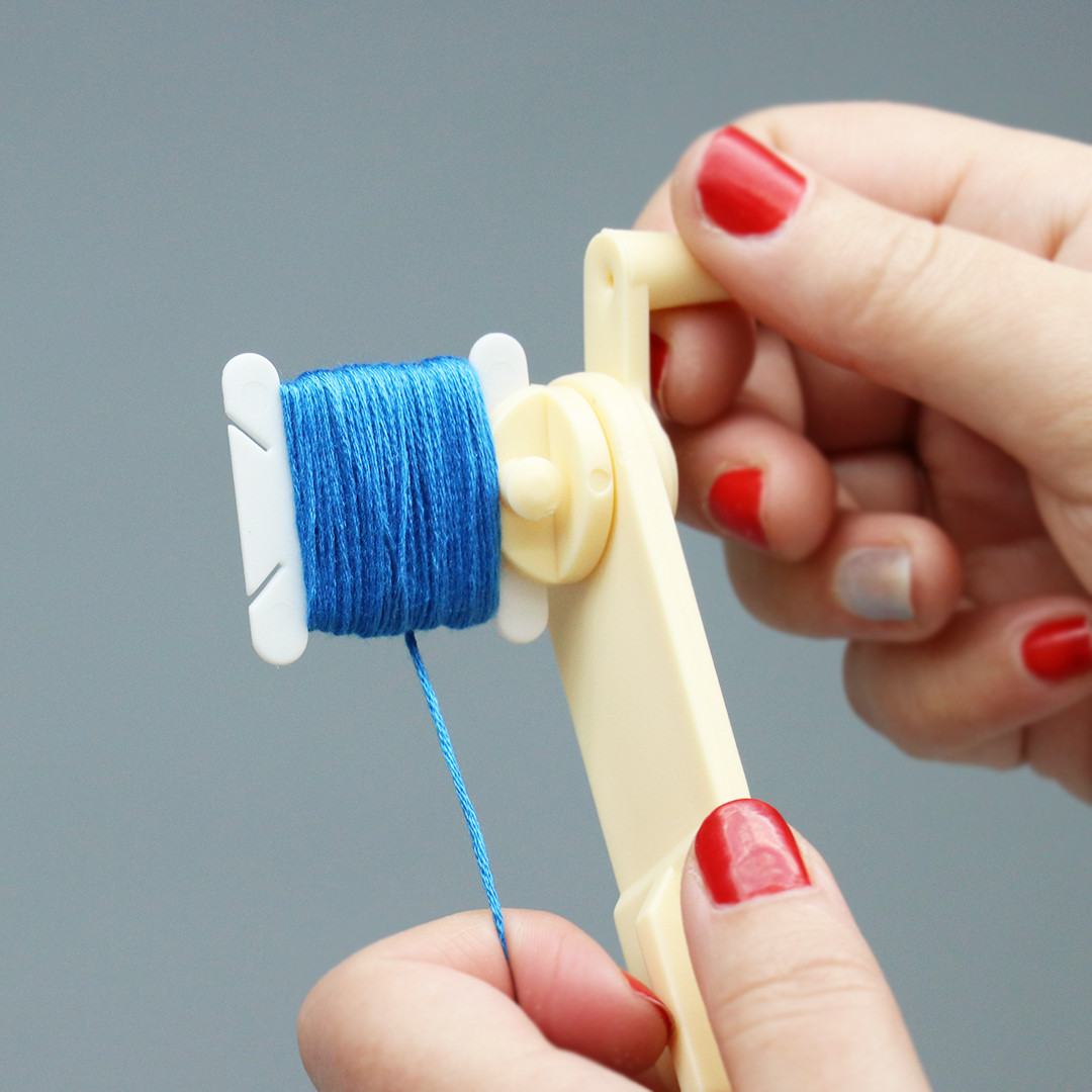 DMC Plastic Bobbins and Bobbin Winder