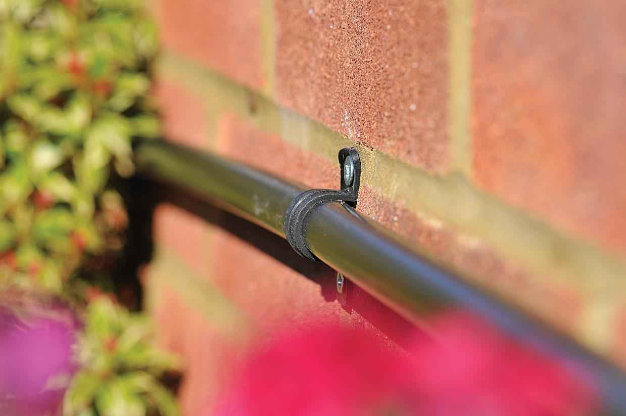 Use the Hozelock Wall Clips to secure 13mm irrigation supply pipe to ...