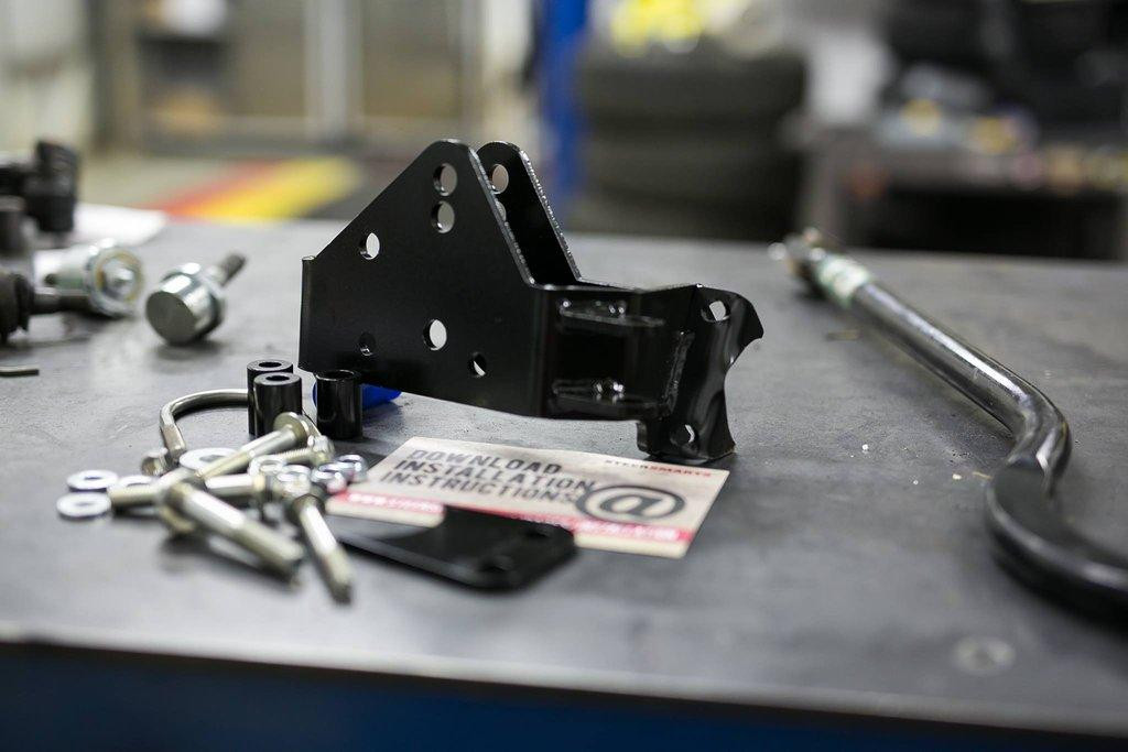 Relocation bracket corrects the trackbar geometry on top mounted ...