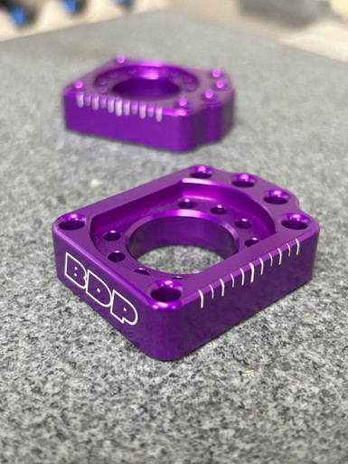YZ 125 250 (2 stroke) 2002-2025 axle blocks V2.0 - Purple - BDP Racing LLC