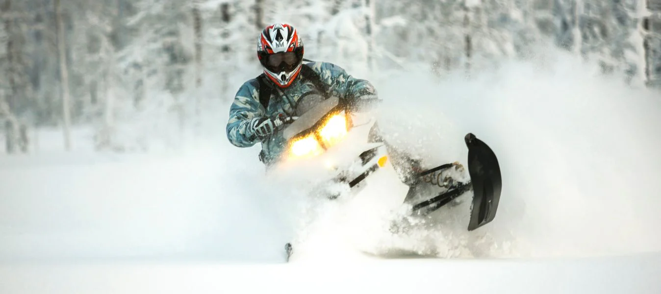 What To Pack for Your Next Snowmobiling Trip - Escape Outdoors