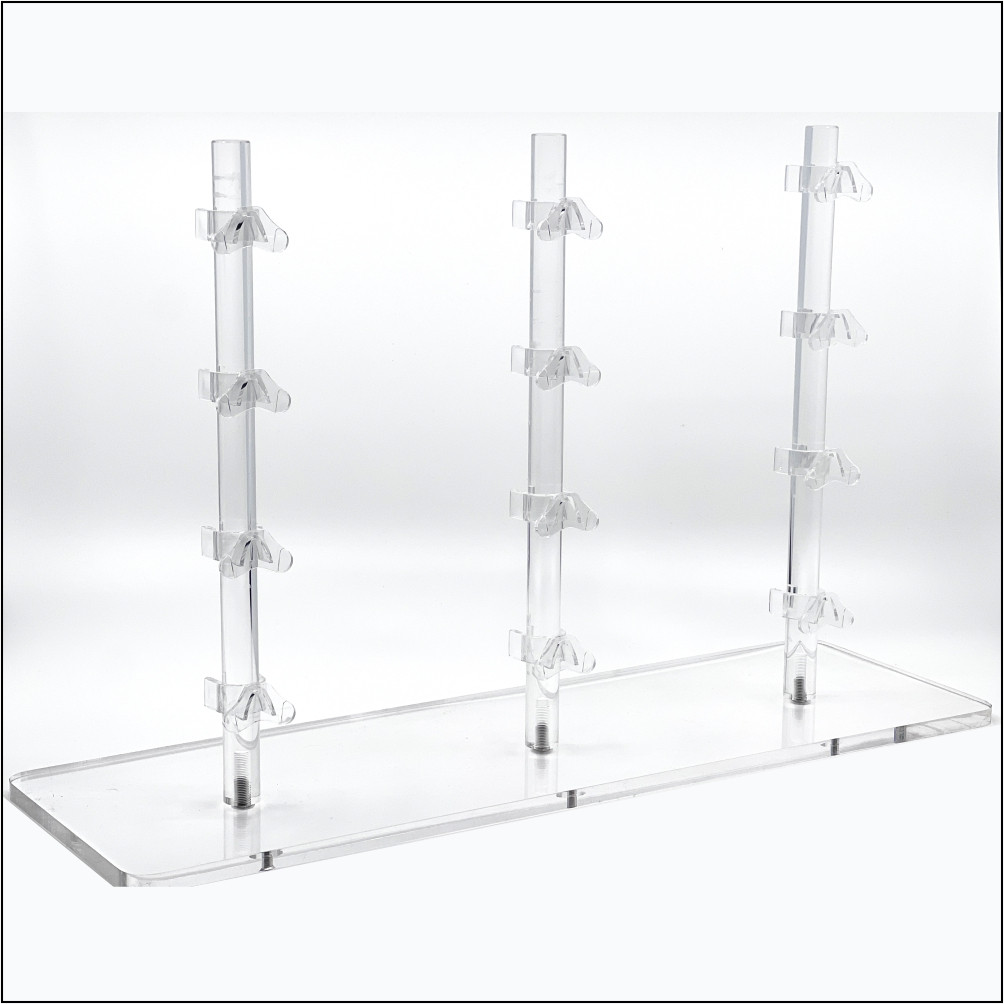 Triple Optical Frame Display Risers with 3x4 Triangular Clips in a Row