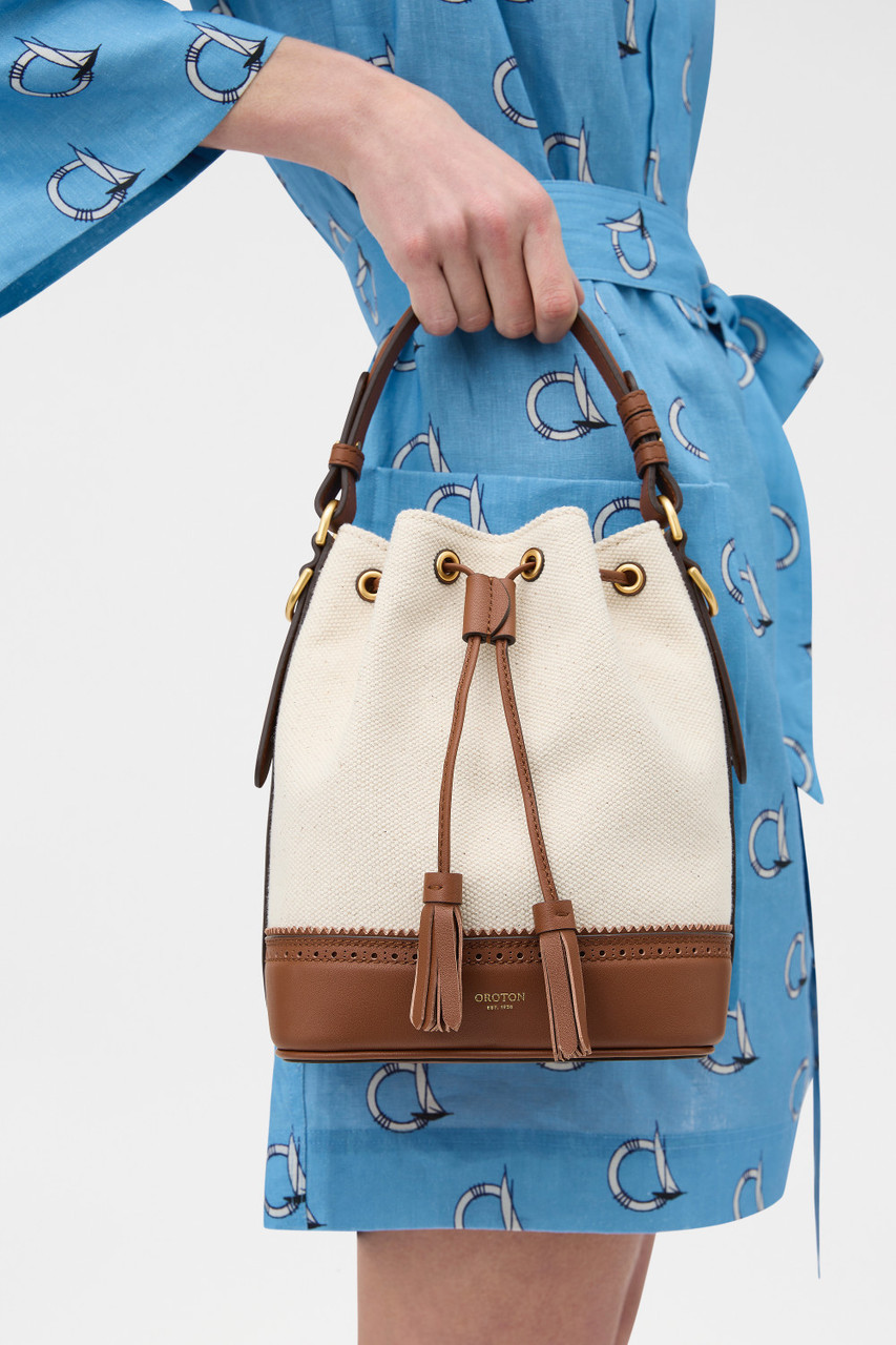 MAGGIE BUCKET CANVAS BROGUING - NATURAL/PENNY BROWN | Oroton