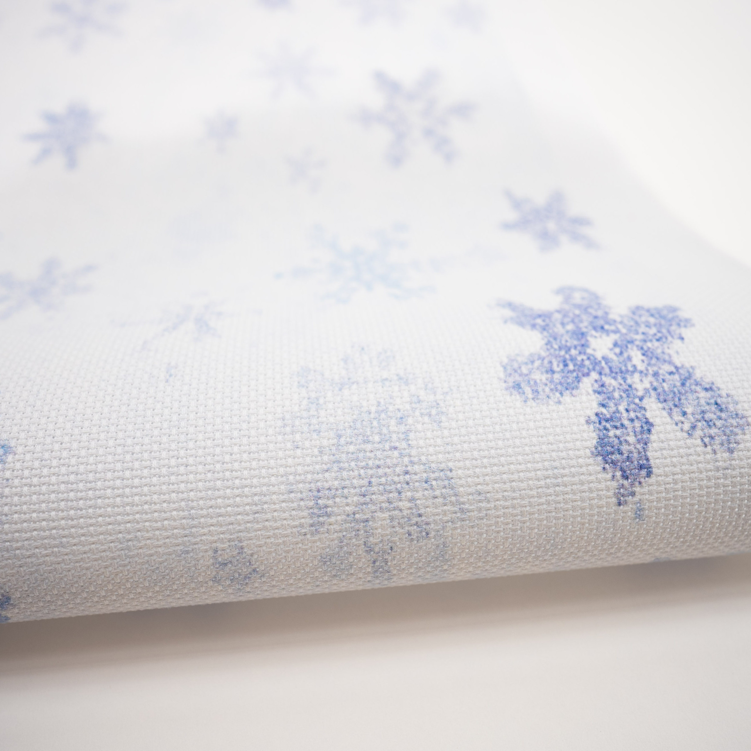 Faded Snowflakes on White Cross Stitch Fabric