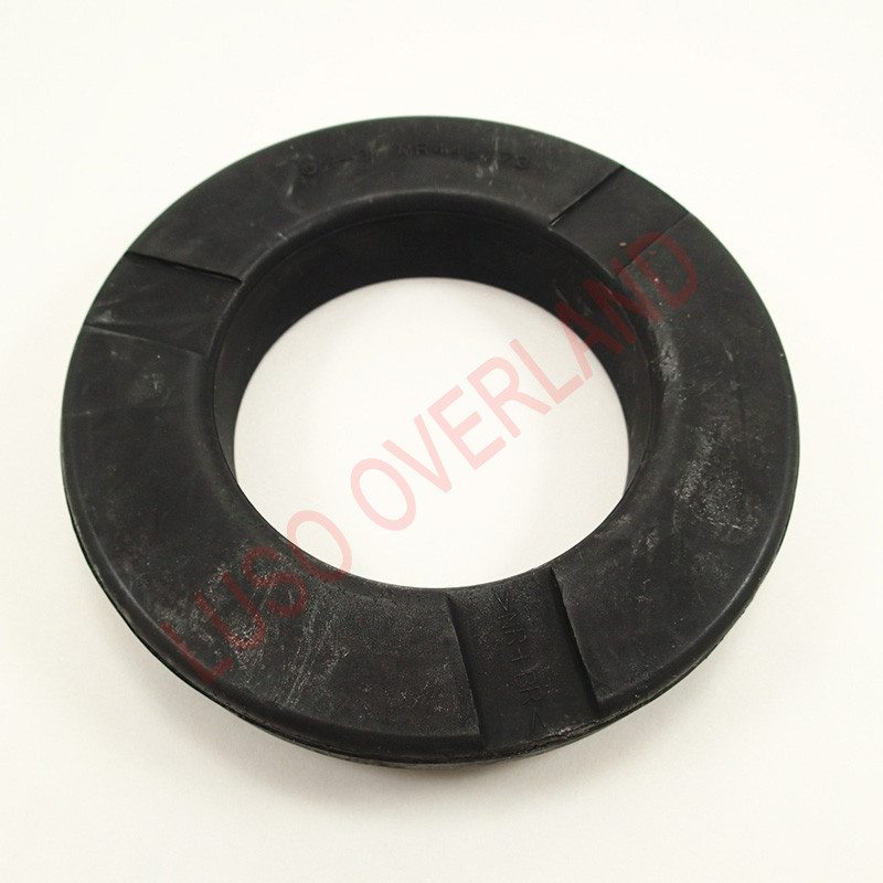 MONTERO Gen3 - Front Coil Spring Pad, Upper (MR448173)