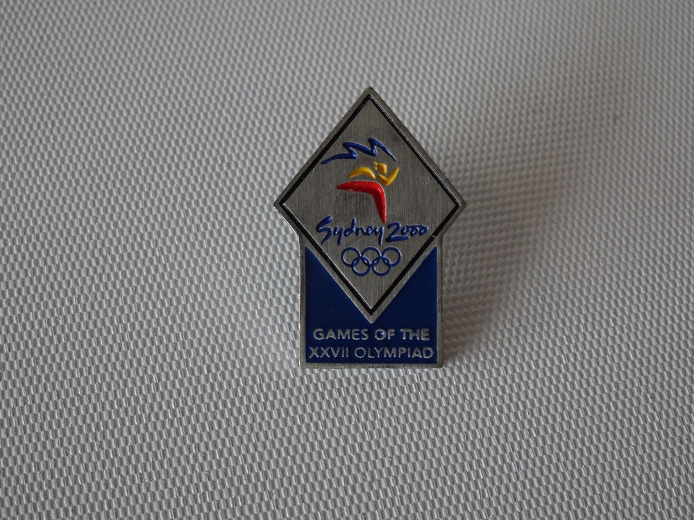 Assorted Collection of Olympic Pins from Around the World