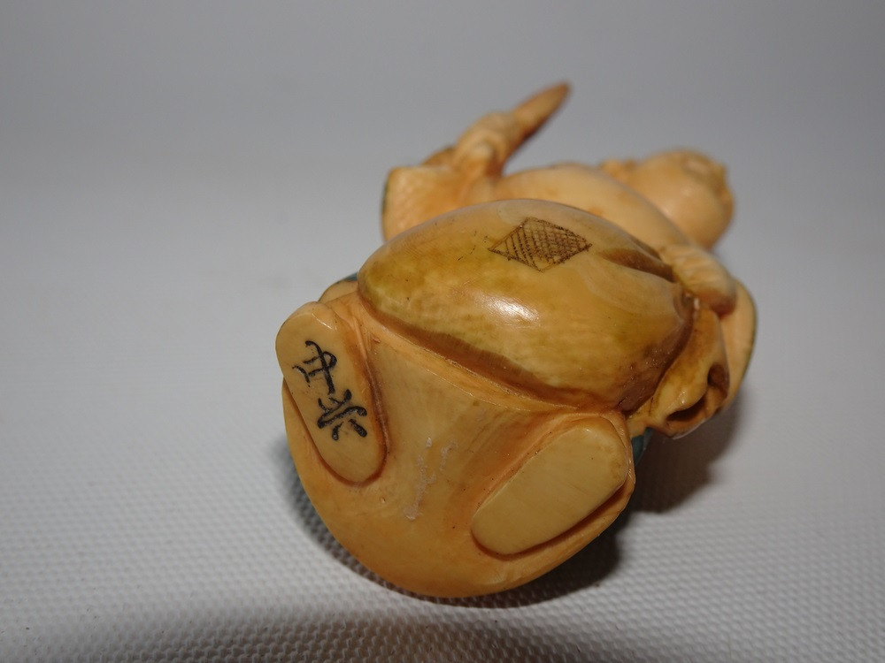 Antique Japanese Netsuke of Hotei Holding Bag and Fan – Signed Hand ...