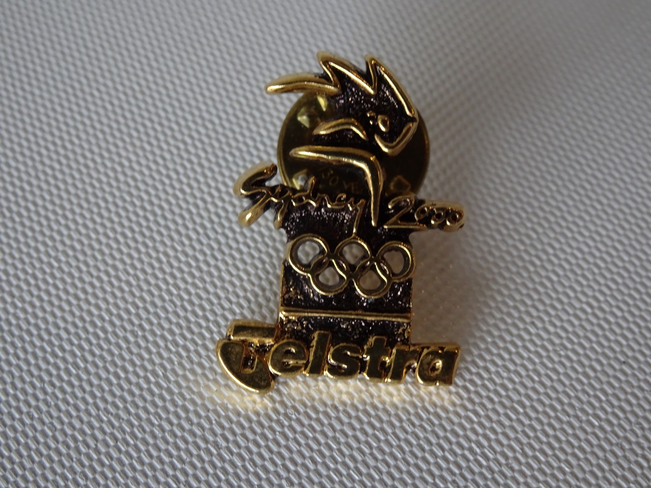 Assorted Collection of Olympic Pins from Around the World