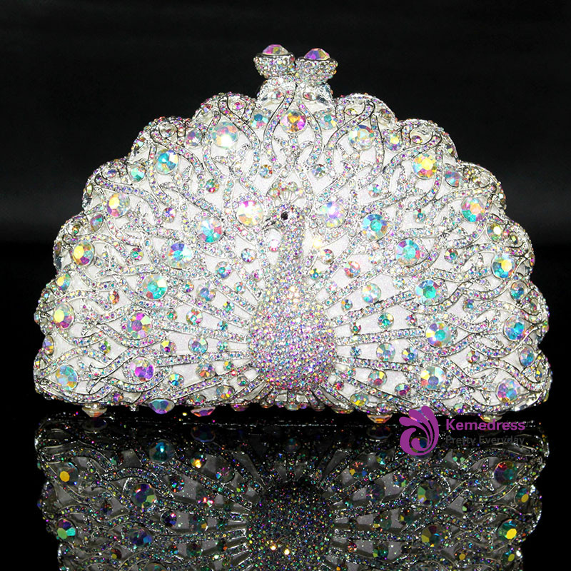 Diamond peacock female hand holding diamond bag