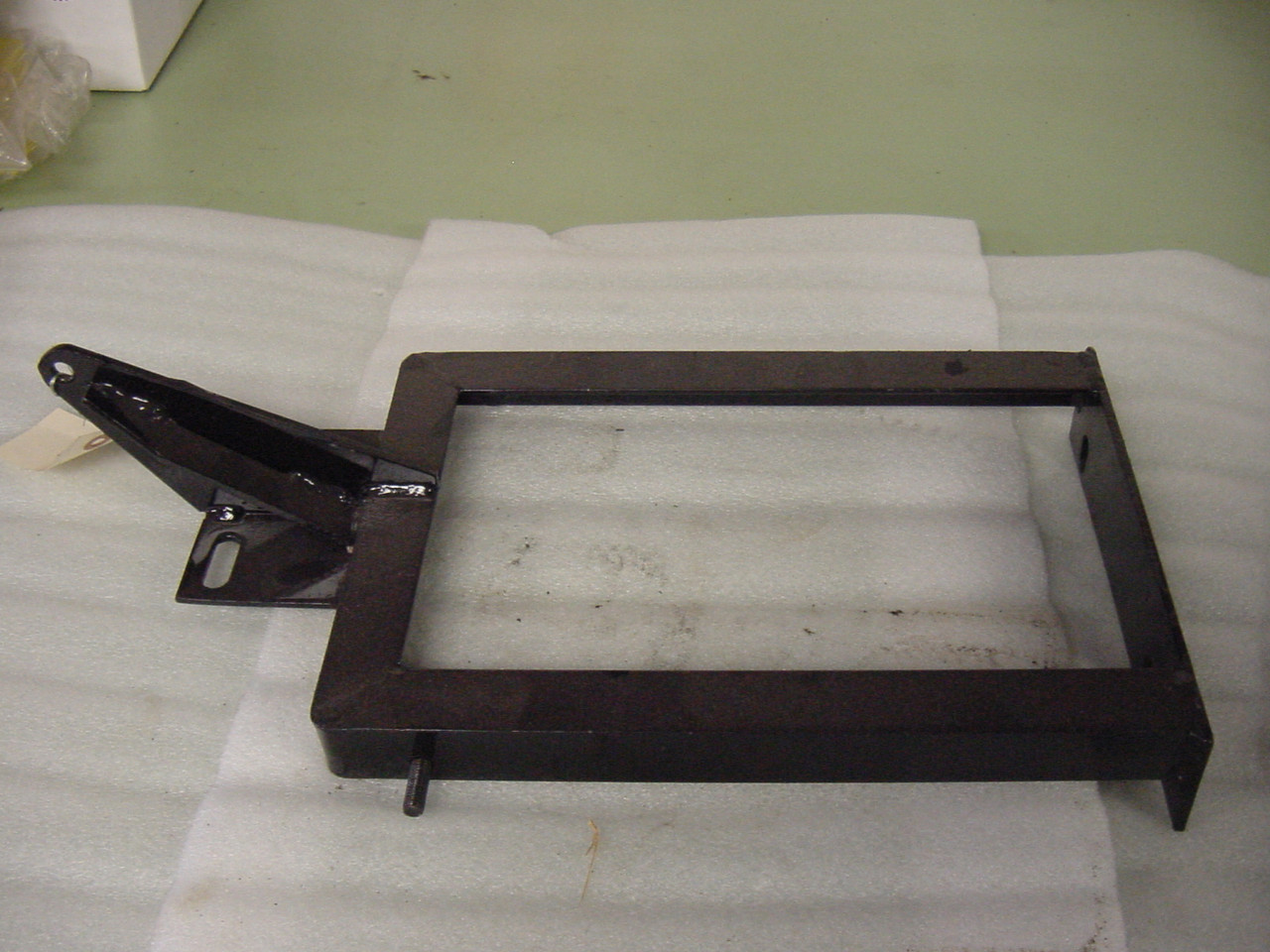 Hood support bracket
