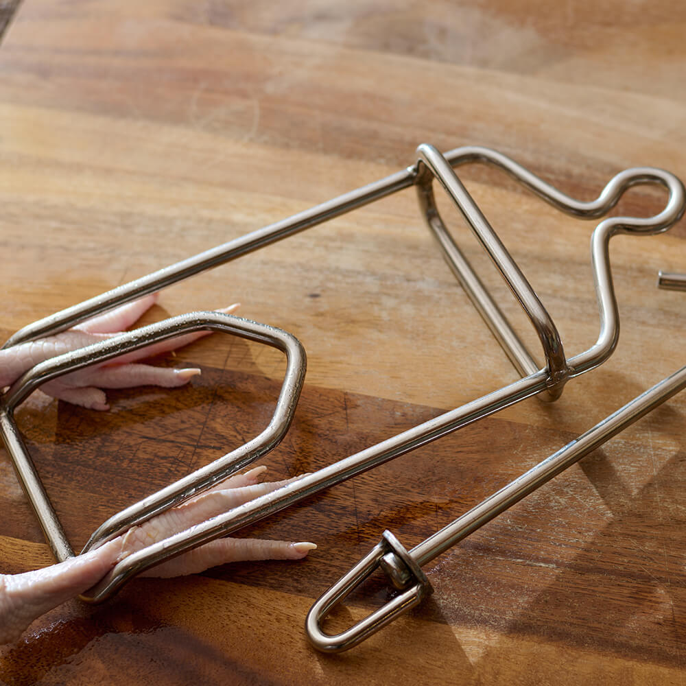 Poultry Shackle Ensures Safe and Effective Scalding - Roots & Harvest®