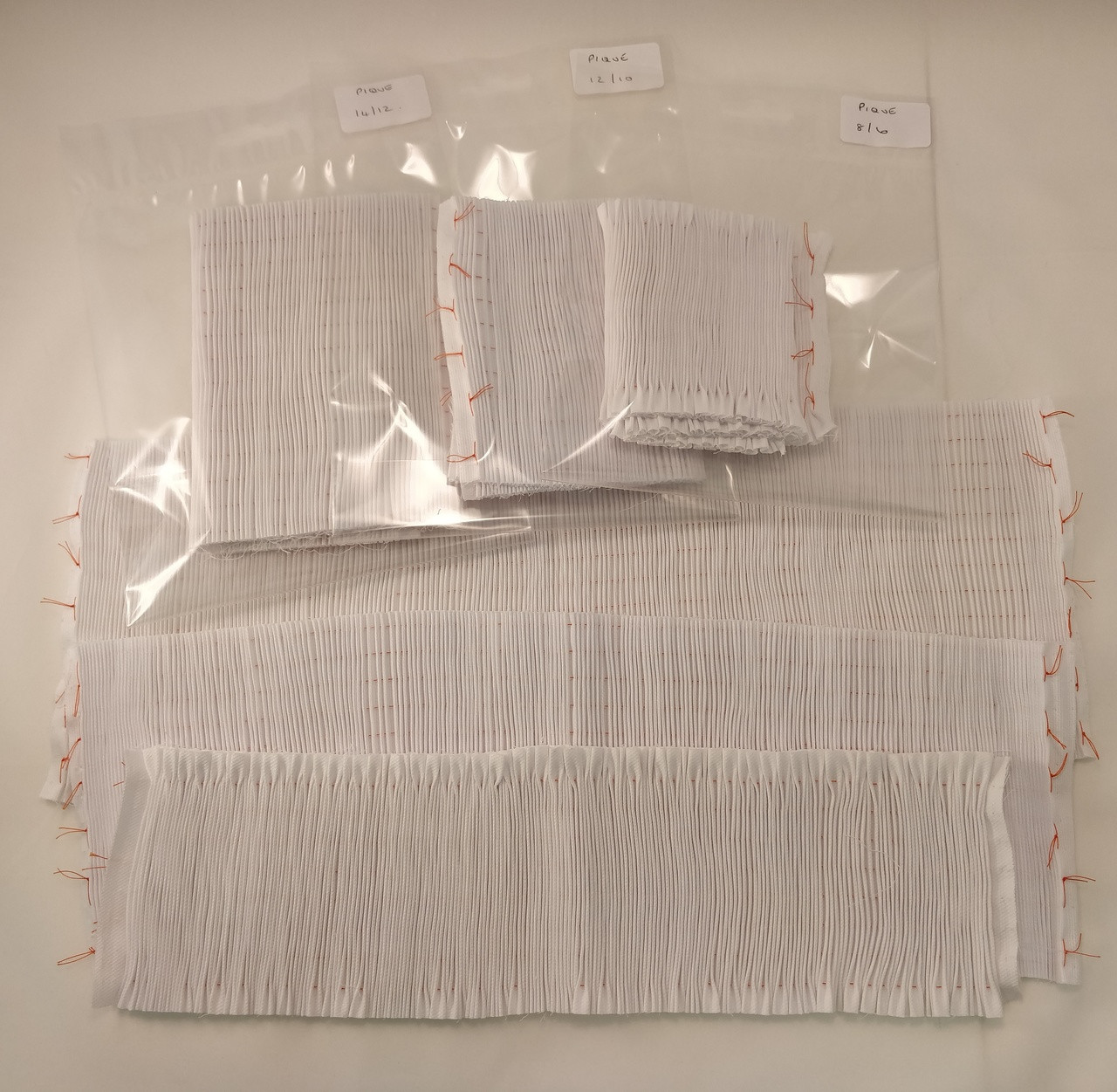 Pre-pleated insert for hand smocking