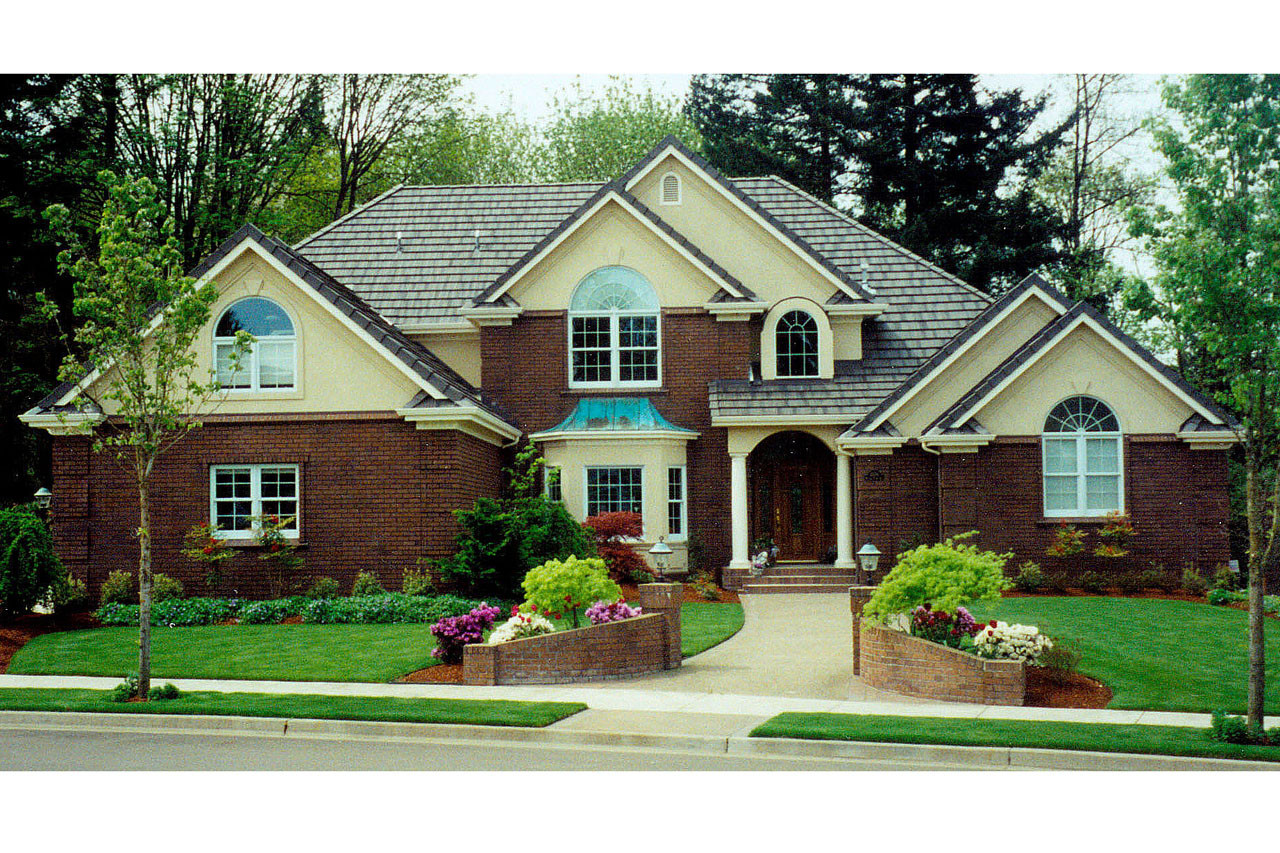 Centralia House Plan has Stately Facade - Associated Designs