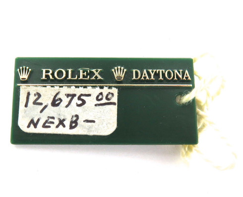 VINTAGE ROLEX MENS DAYTONA GREEN SWING TAG.