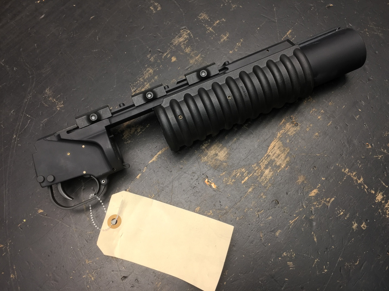 Destructive Devices include all 40mm rounds and firearms