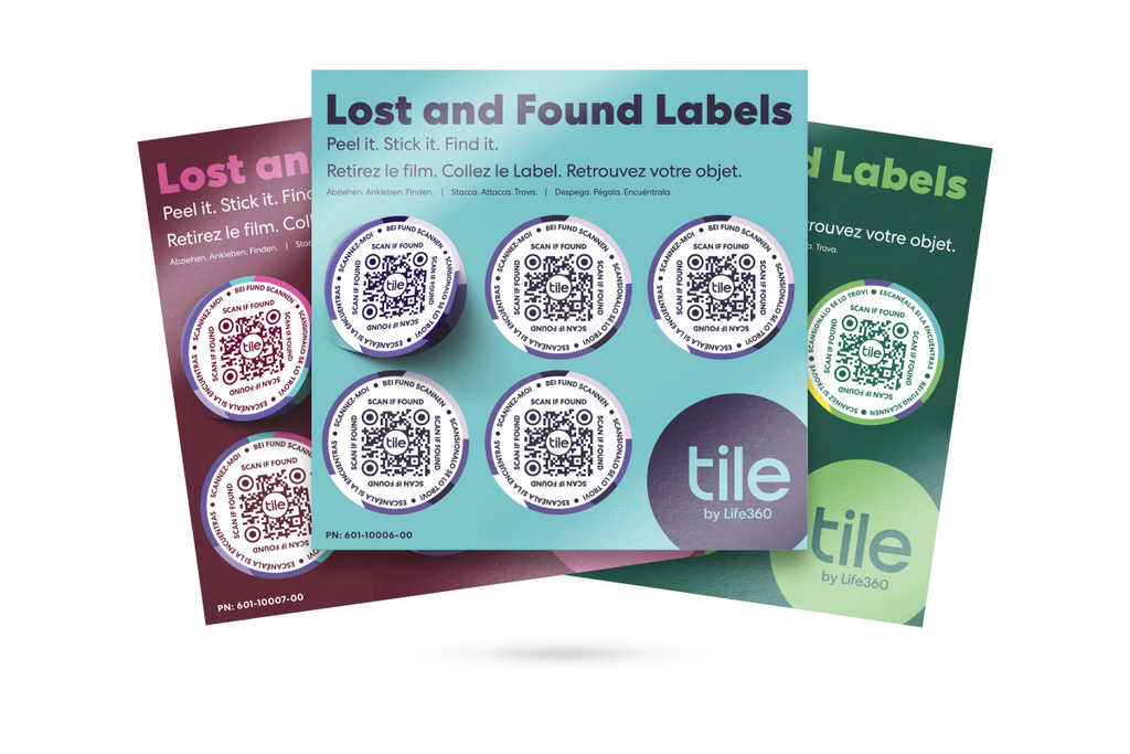 Three stacked sheets of Tile’s Lost and Found Labels