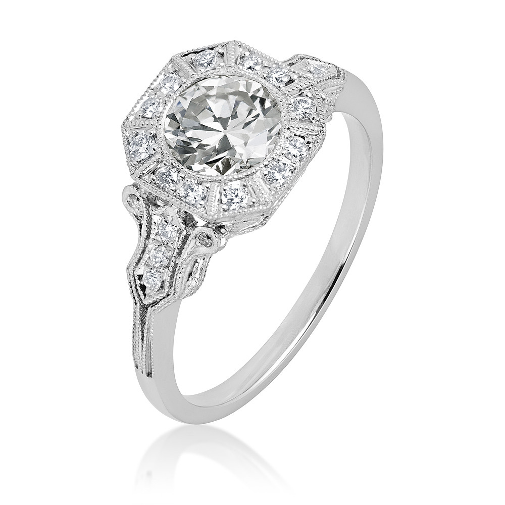 Vintage Platinum and Diamond Bezel Set Engagement Ring