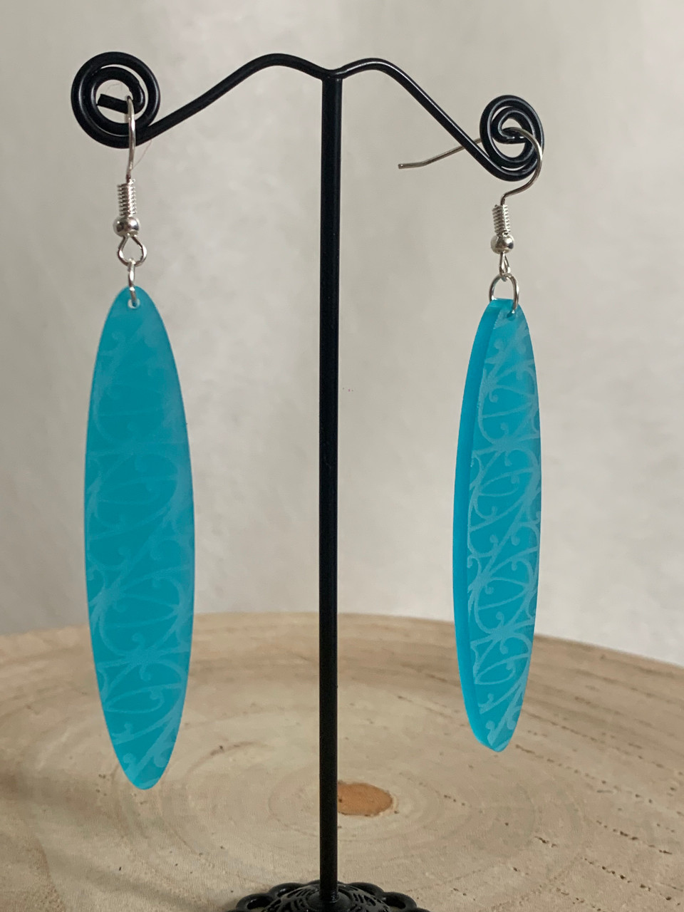 Aqua blue acrylic earrings with pitau design - Adore Collection