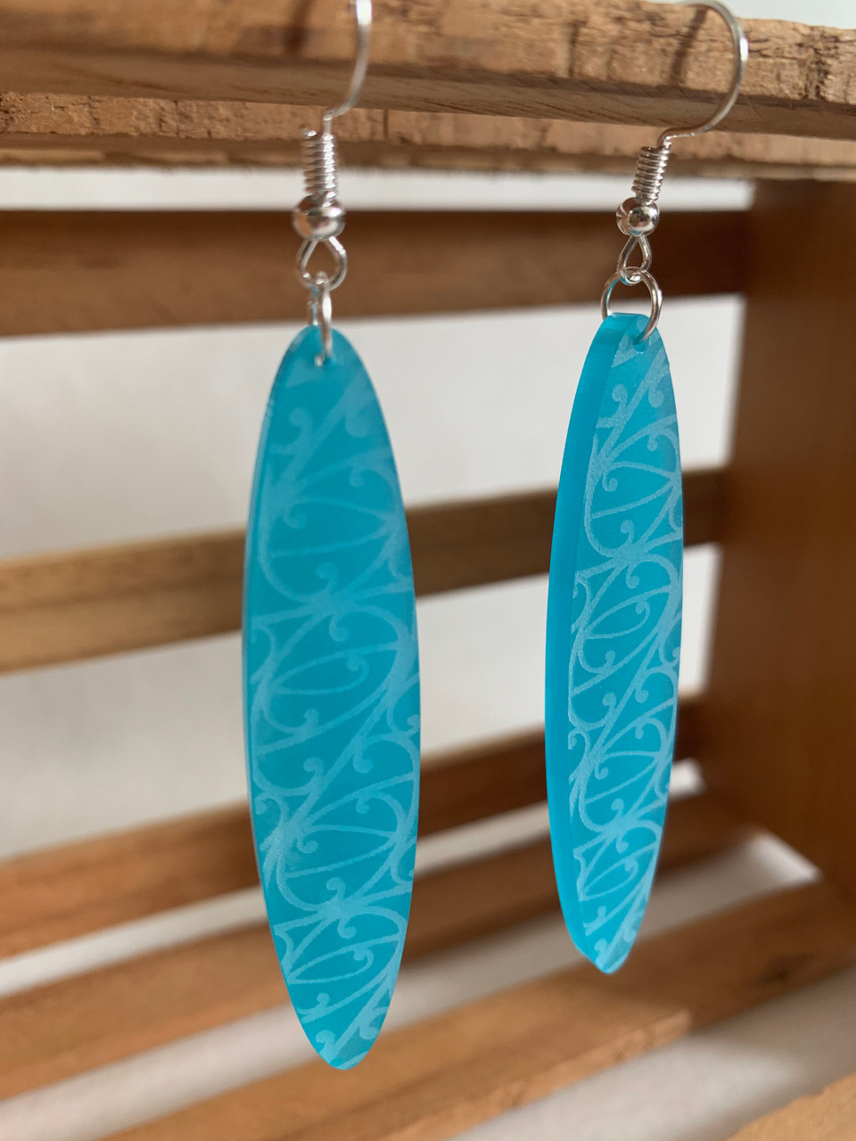 Aqua blue acrylic earrings with pitau design - Adore Collection