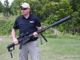 Barrett QDL 50 cal Suppressor in black or tan