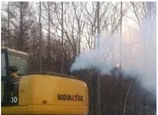 Why Does My Excavator Emit Blue Smoke? - Broken Tractor LLC