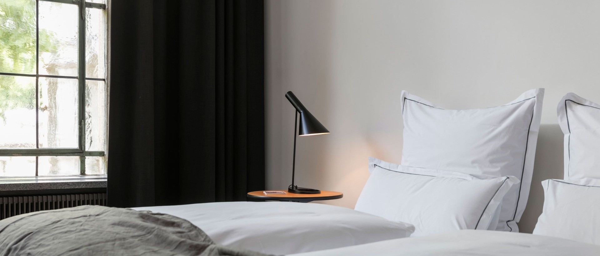 AJ Table Lamp by Louis Poulsen - Iconic Design & Adjustable Lighting