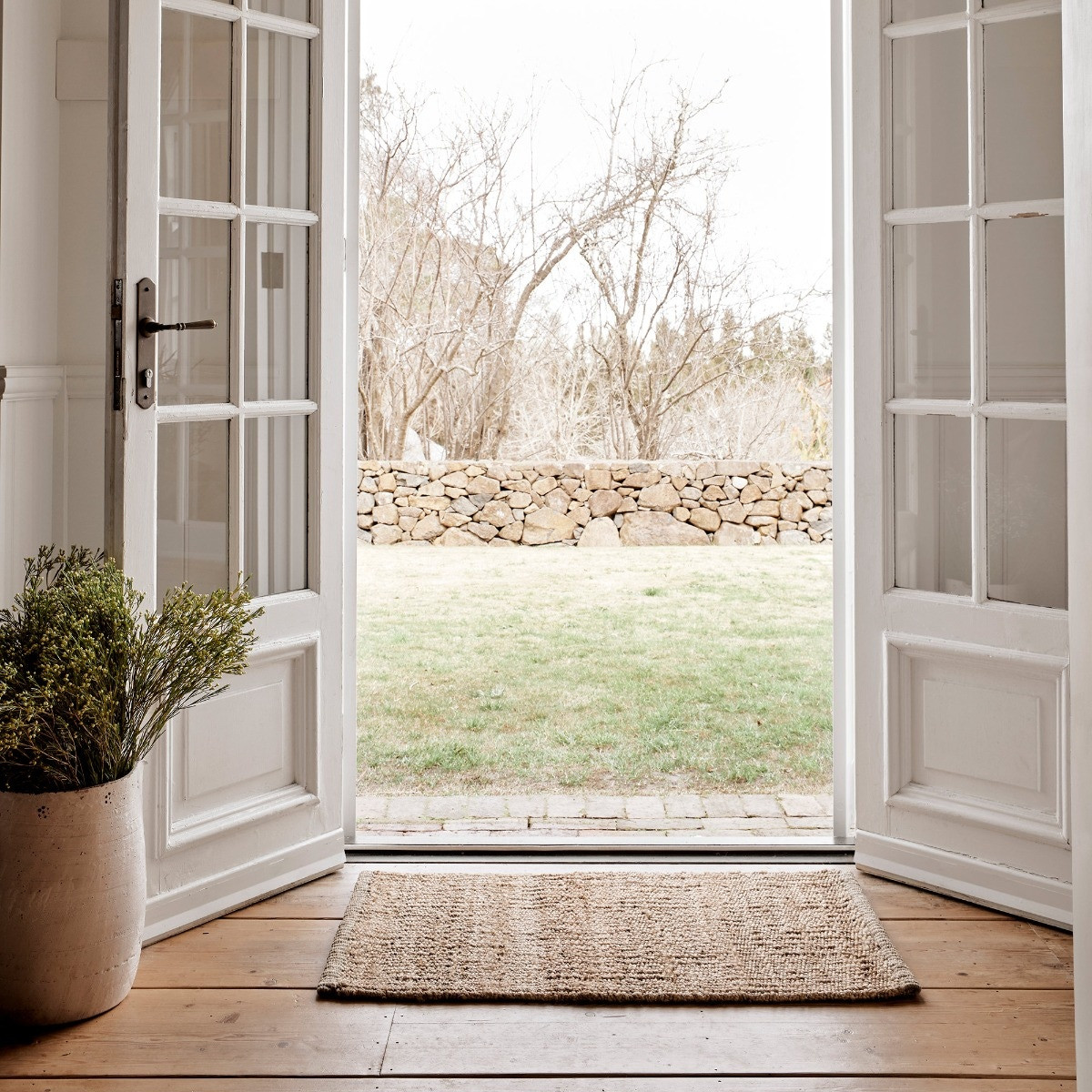 Shop the Elegant Lucine Nook Rug by Armadillo | Hand-Braided Jute Decor