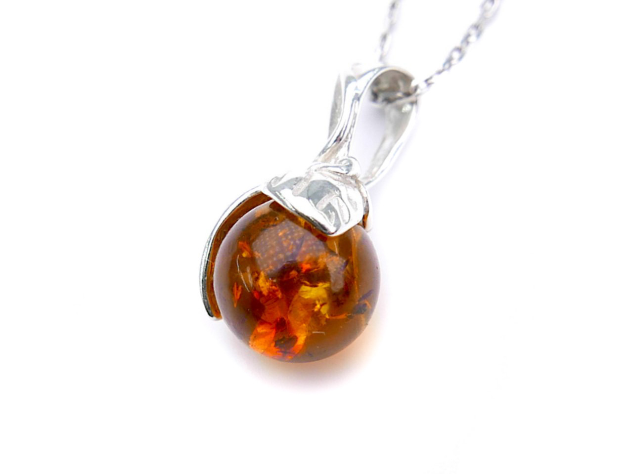 Baltic amber ball pendant in sterling silver - GoAmber – Amber ...