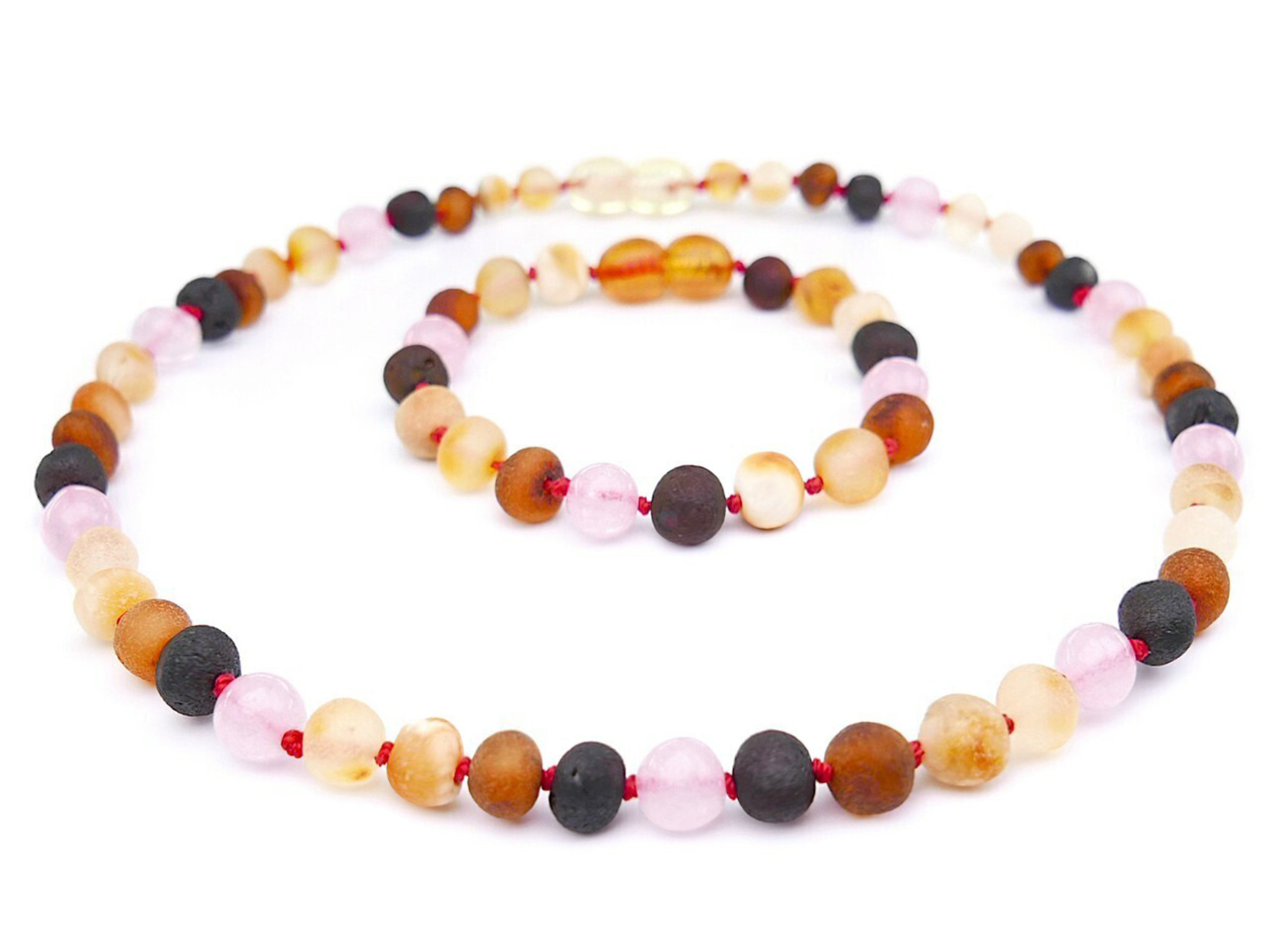 Pink quartz amber teething set with raw unpolished beads