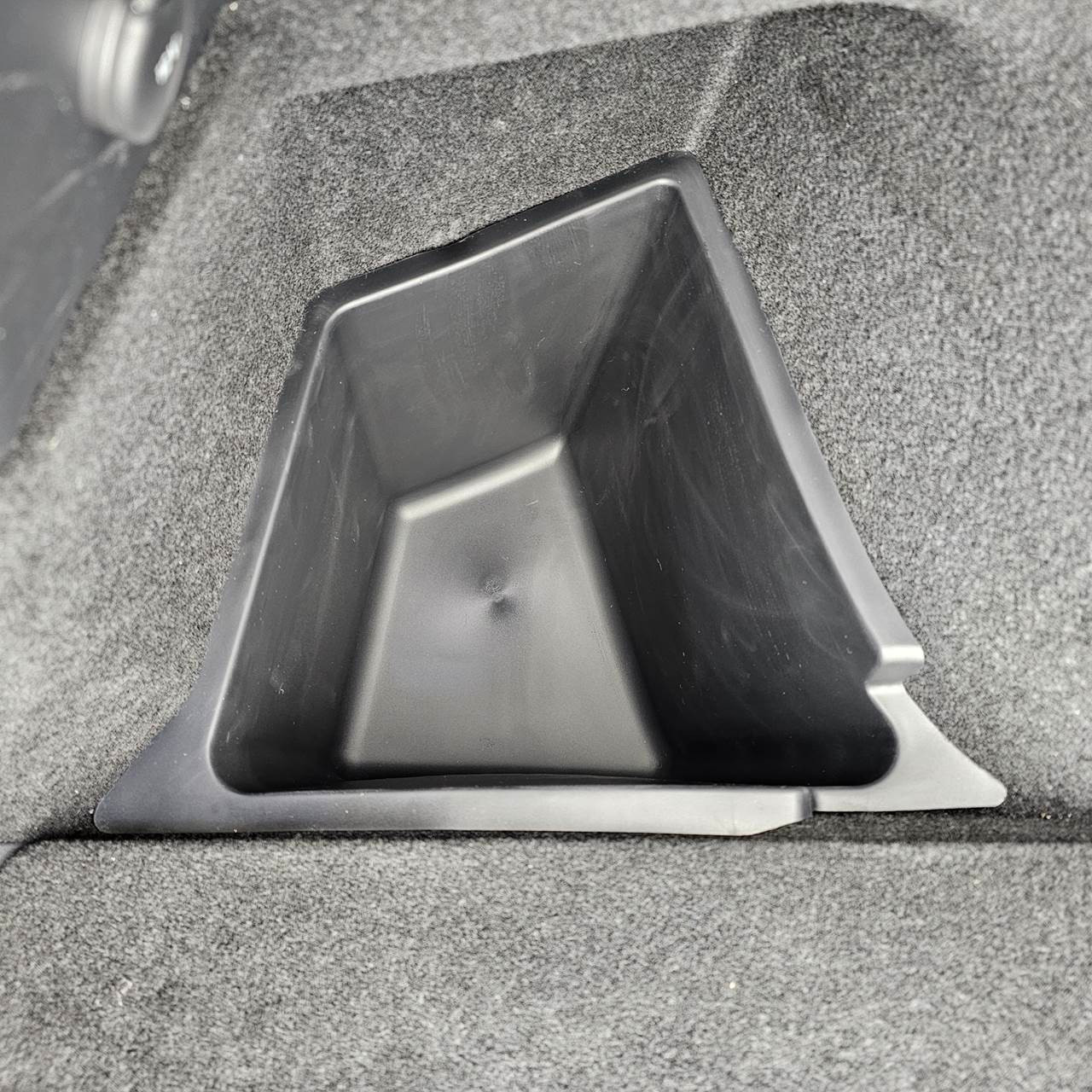 Model Y Trunk side storage bins with carpet lids