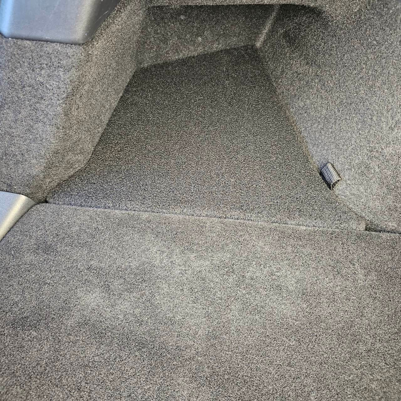 Model Y Trunk side storage bins with carpet lids