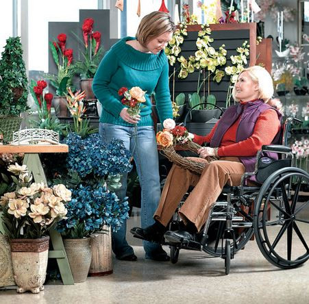 Invacare Tracer SX5 Wheelchair with Desk Length Arms and 20" Seat