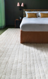 Coco Plain White Textured Merino Wool rug by The Rug Company