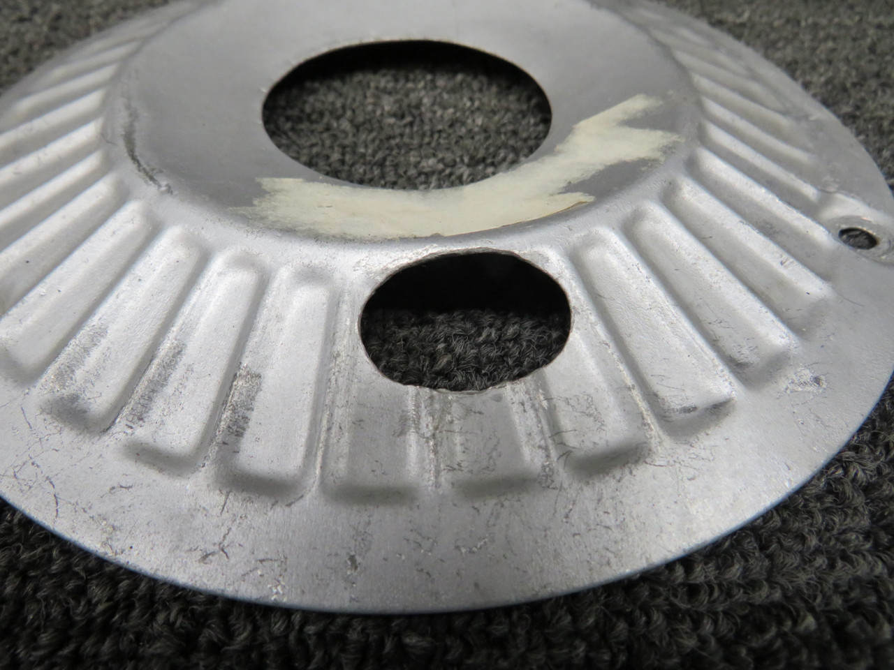 Grumman AA-1B Landing Gear Hub Cap with Worn Holes