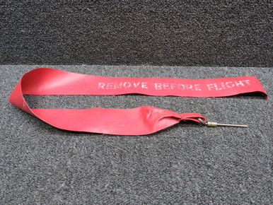 Red Remove Before Flight Banner With Faded Lettering