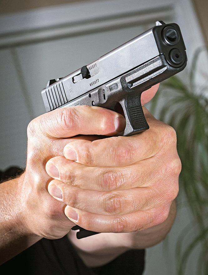 Like a Glove: Picking a Handgun to Fit Your Grip - COMBAT ARMORY
