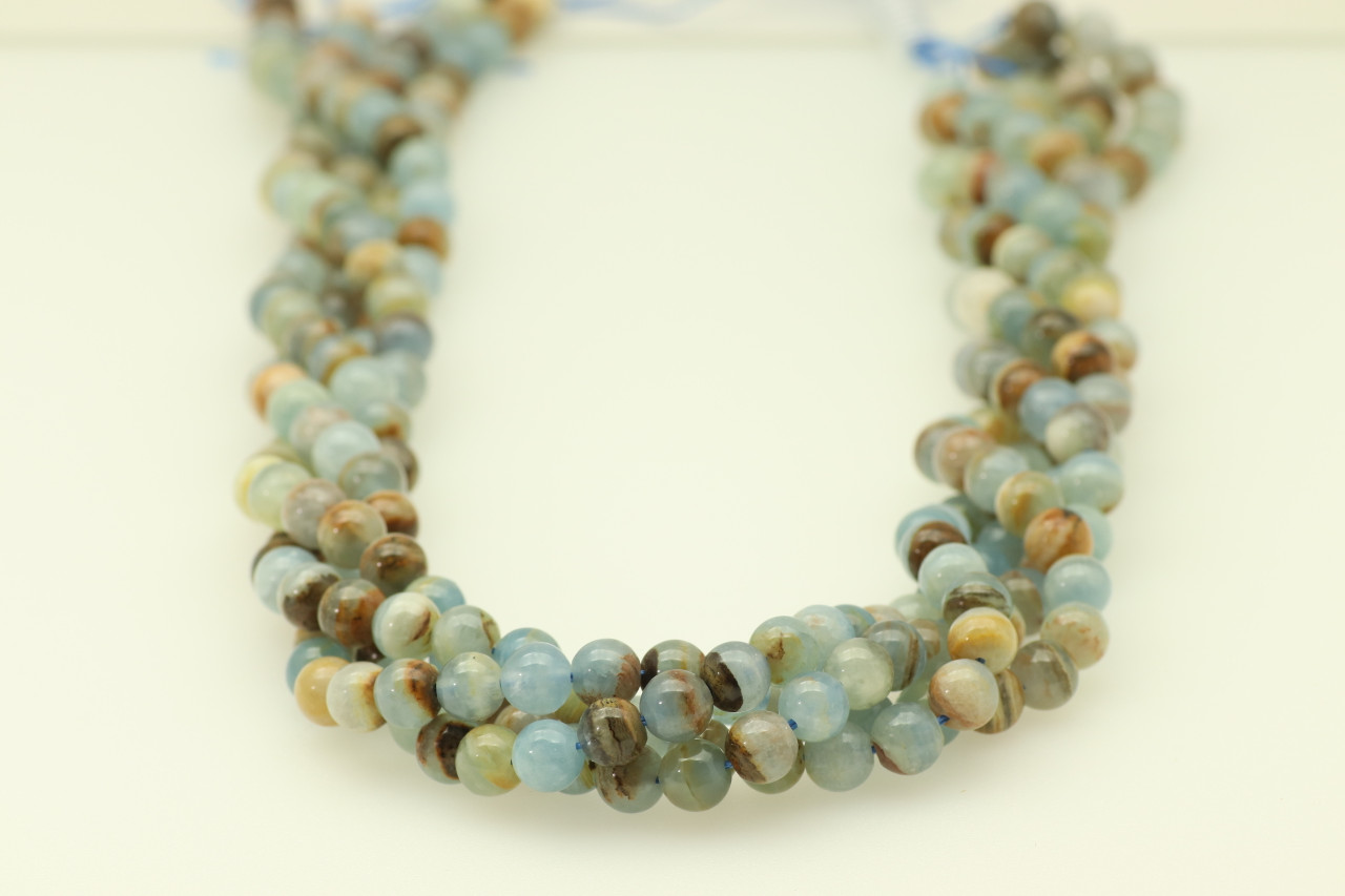 Selenite, Blue, Smooth Round in sizes 6mm & 8mm. Price Per Strand