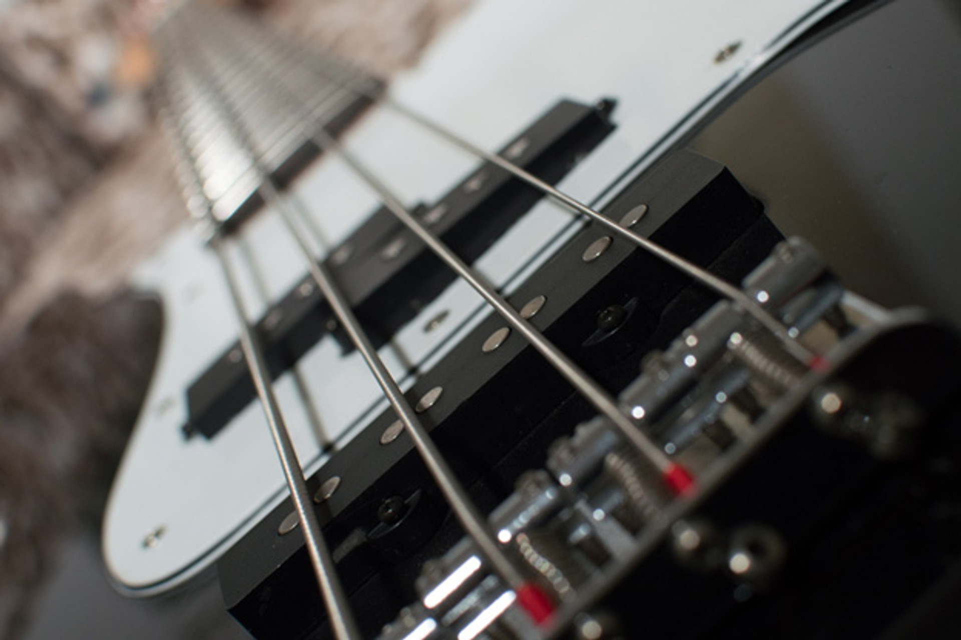 Step-by-Step Guide on How to String a Bass Guitar - Strings and Beyond