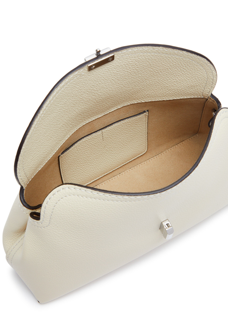 TOTEME T-Lock leather clutch | Harvey Nichols