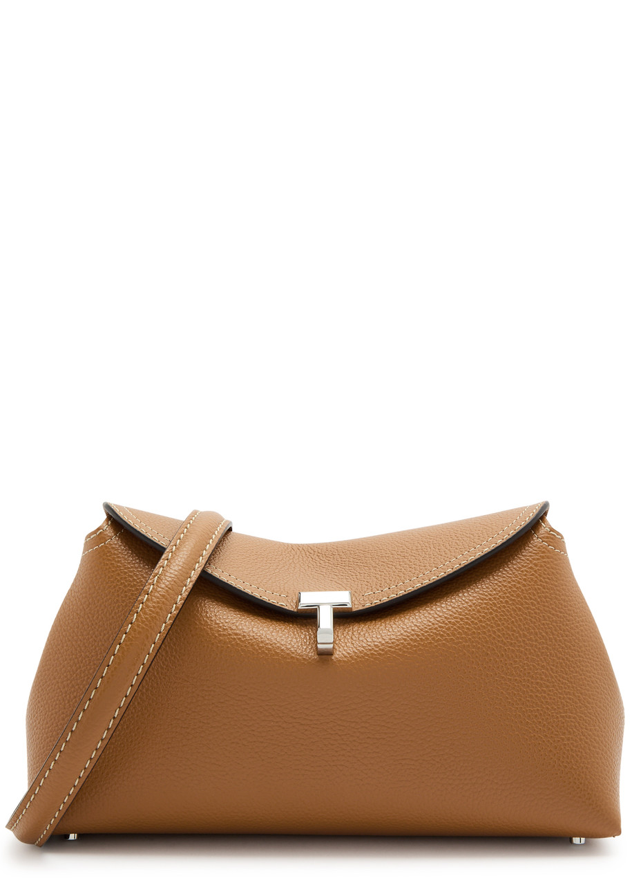 TOTEME T-Lock leather clutch | Harvey Nichols