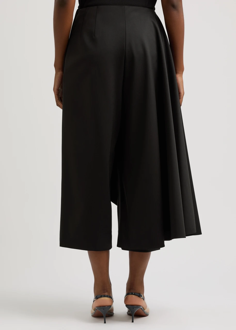 ALAÏA Asymmetric layered stretch-wool trousers | Harvey Nichols