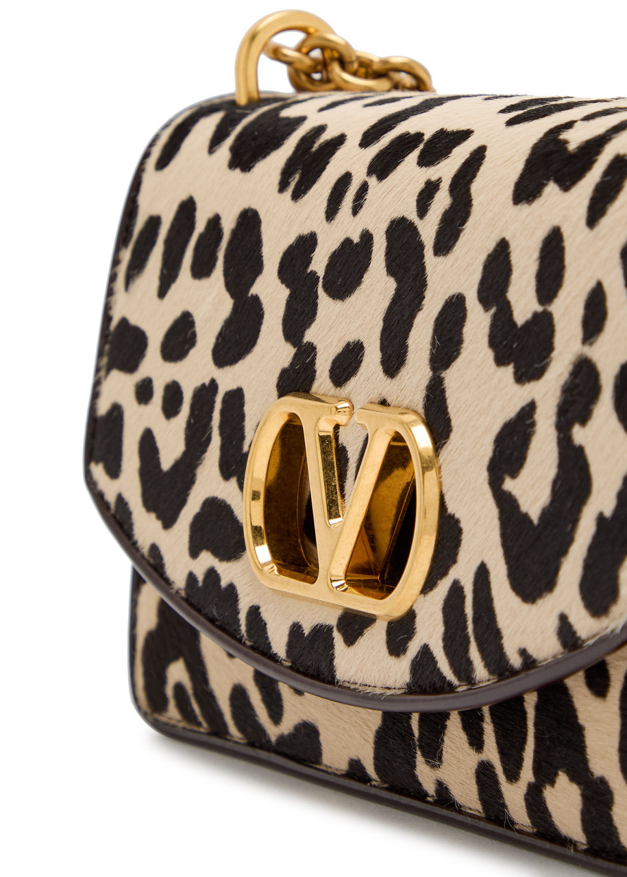 VALENTINO GARAVANI Vain small cow-print leather and calf-hair shoulder ...