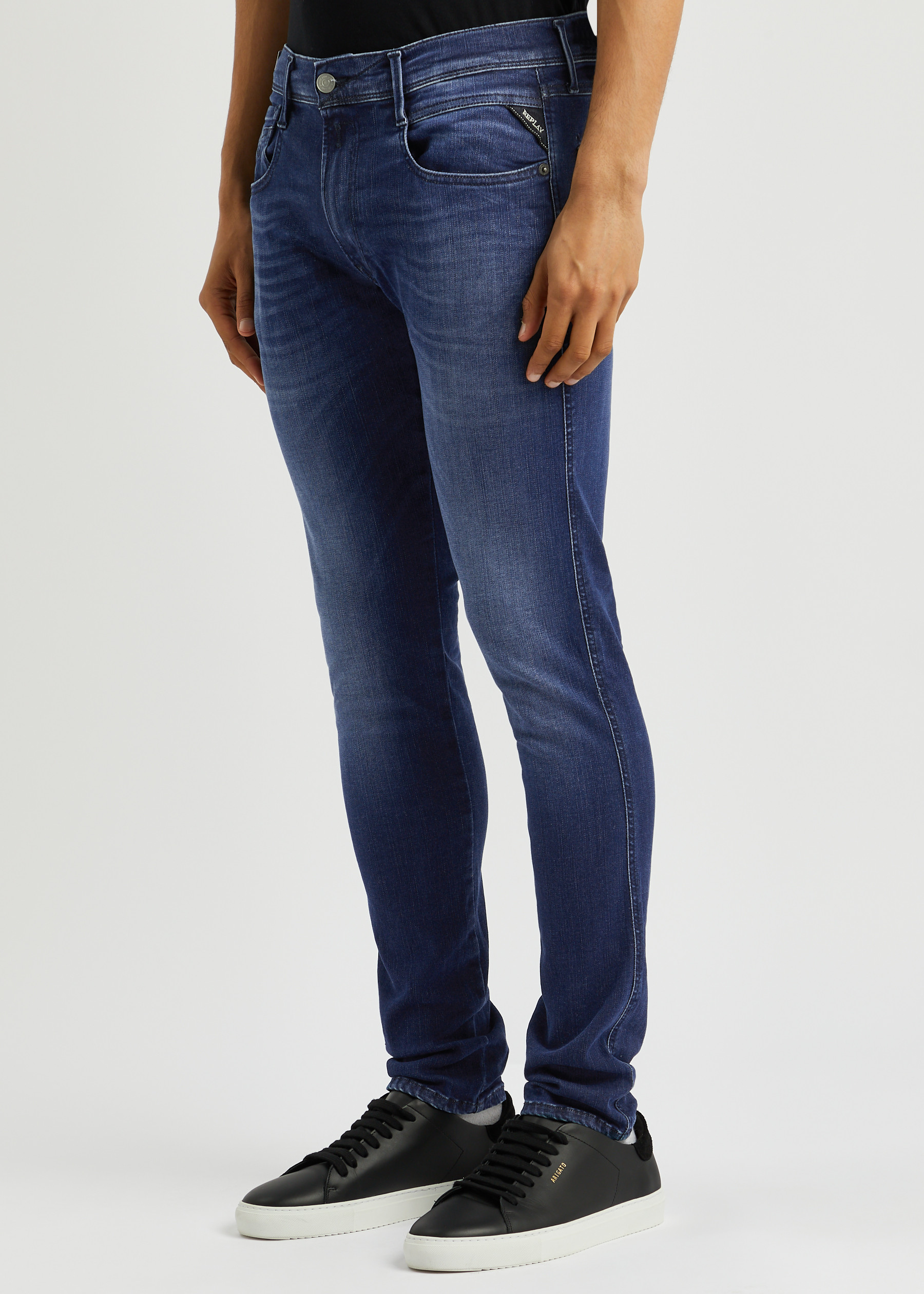 REPLAY Anbass Hyperflex slim-leg jeans | Harvey Nichols