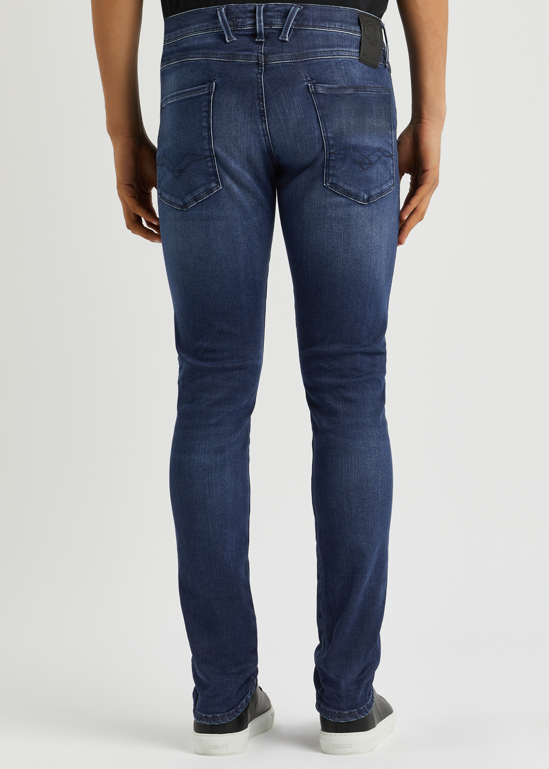REPLAY Anbass Hyperflex slim-leg jeans | Harvey Nichols