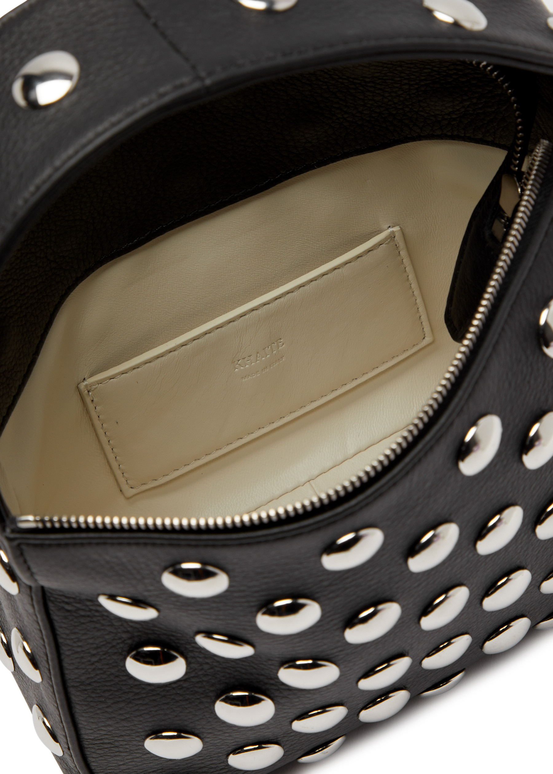 KHAITE Elena small studded leather top handle bag | Harvey Nichols