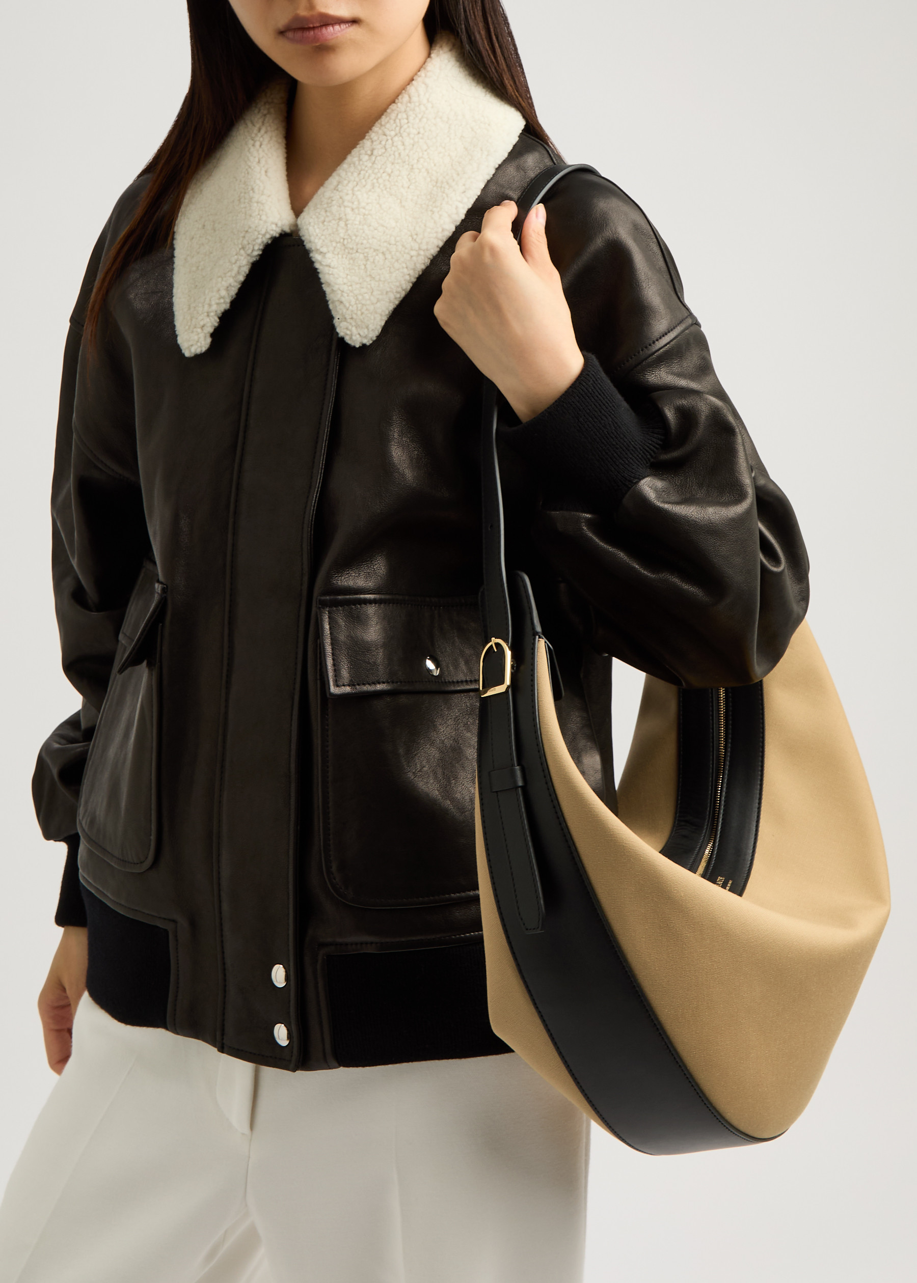 KHAITE Augustina panelled canvas hobo bag | Harvey Nichols