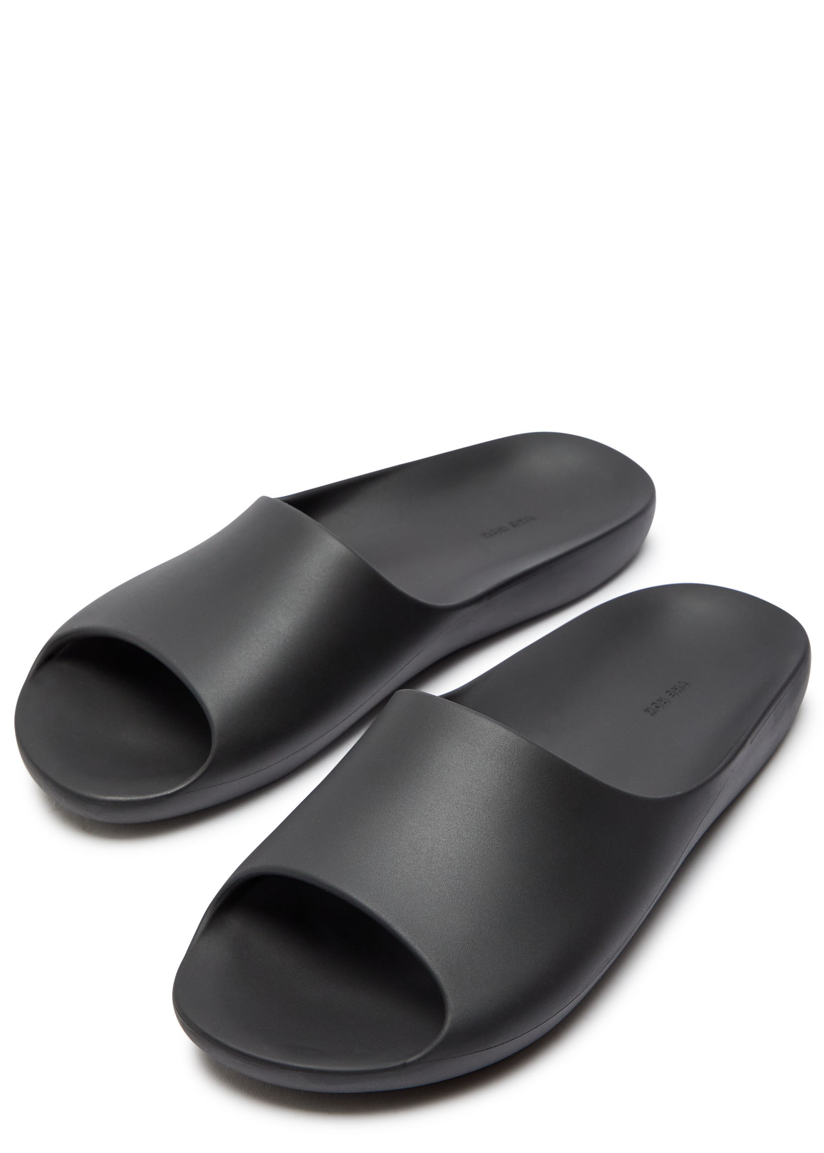 THE ROW Ama rubber sliders | Harvey Nichols