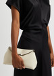 TOTEME T-Lock leather clutch | Harvey Nichols