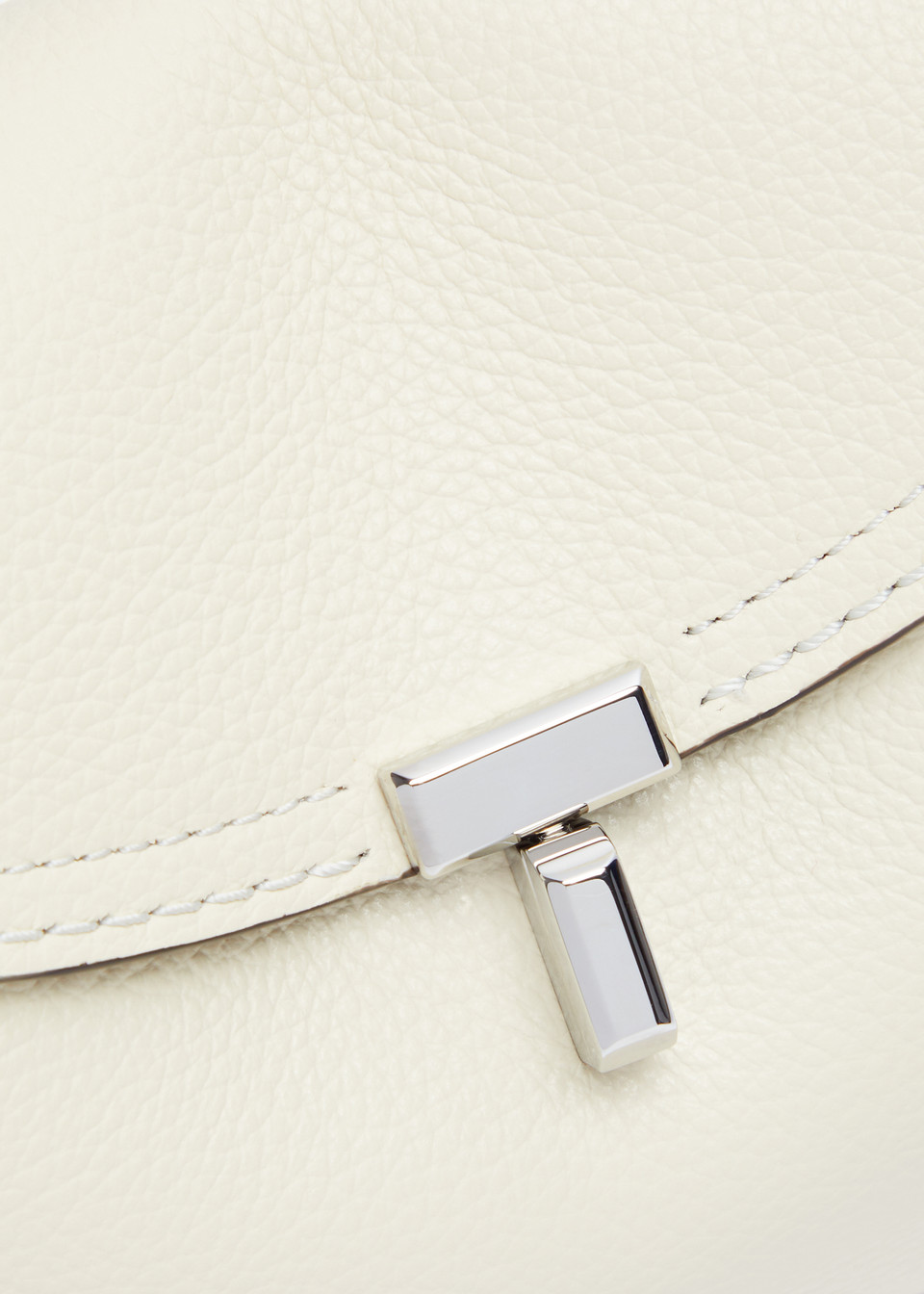 TOTEME T-Lock leather clutch | Harvey Nichols