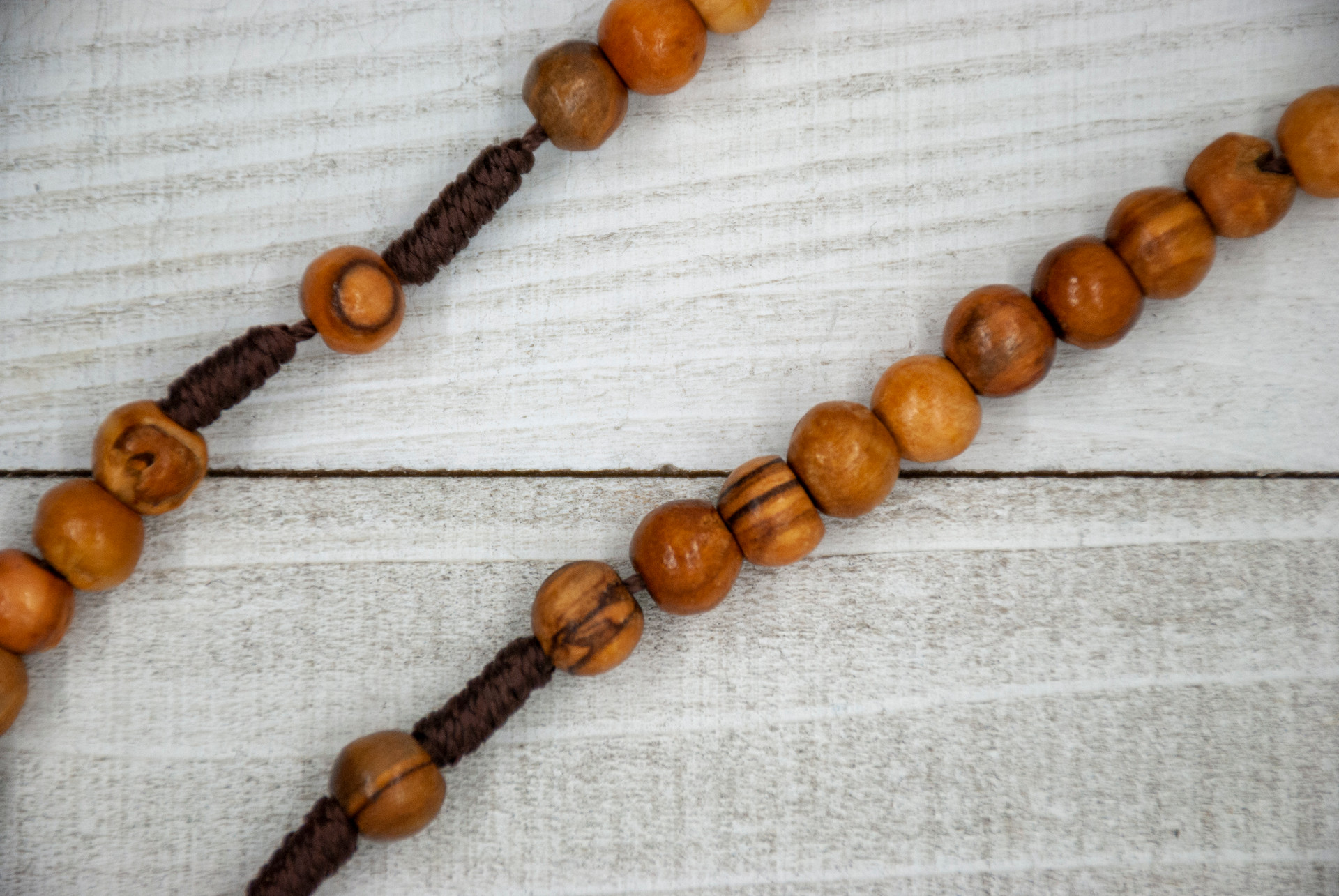 Kant Tangle Rosary with Natural Wood Beads - Trinity Church Supply